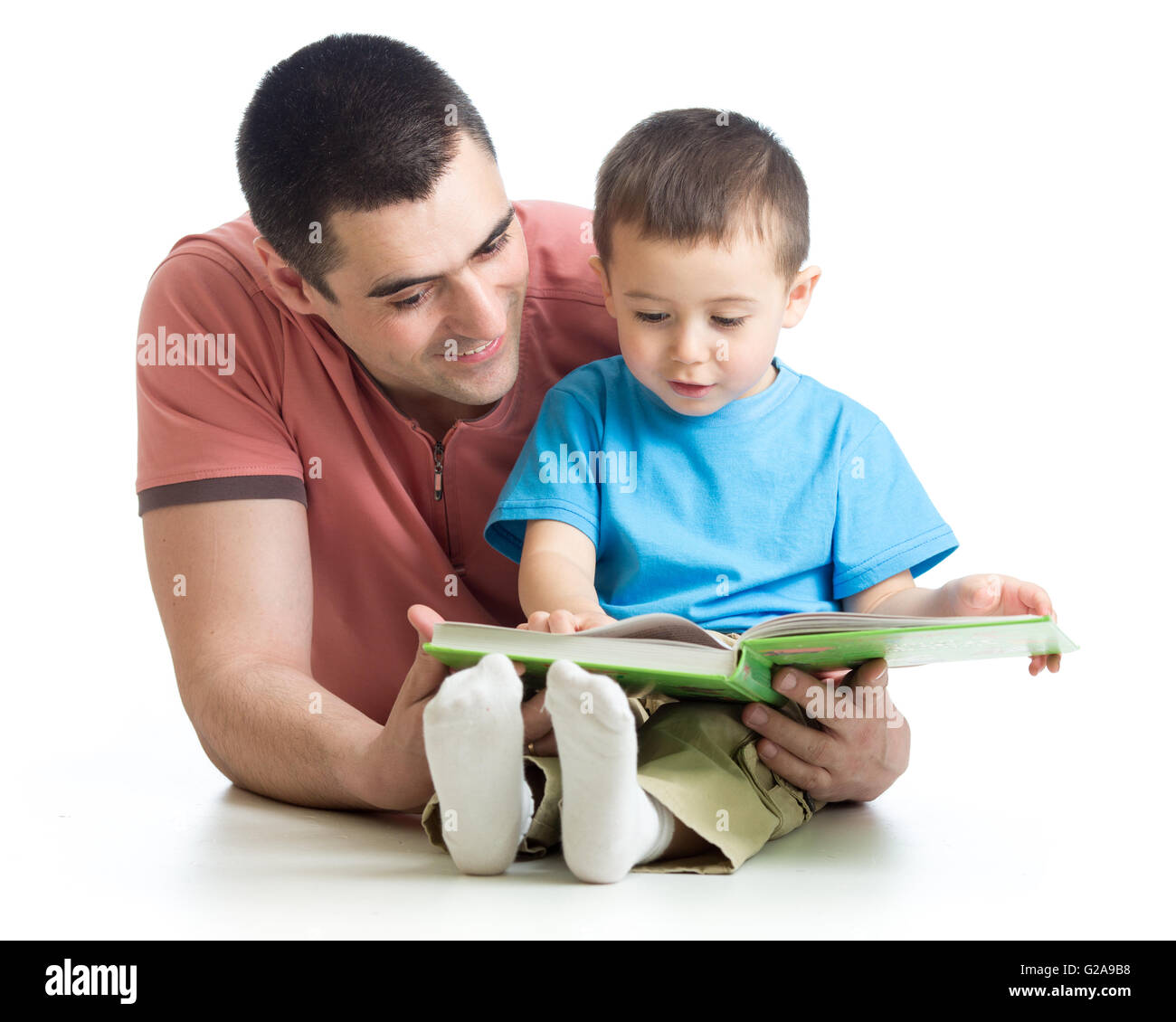 Father and son reading together Stock Photo - Alamy