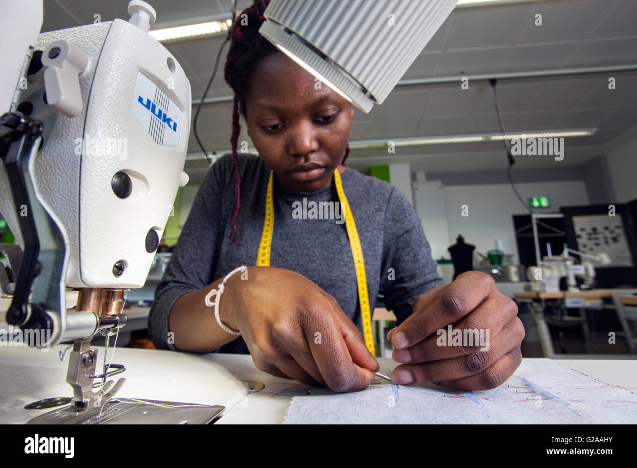 Practical lessons on the sewing machine for budding seamstresses Stock ...