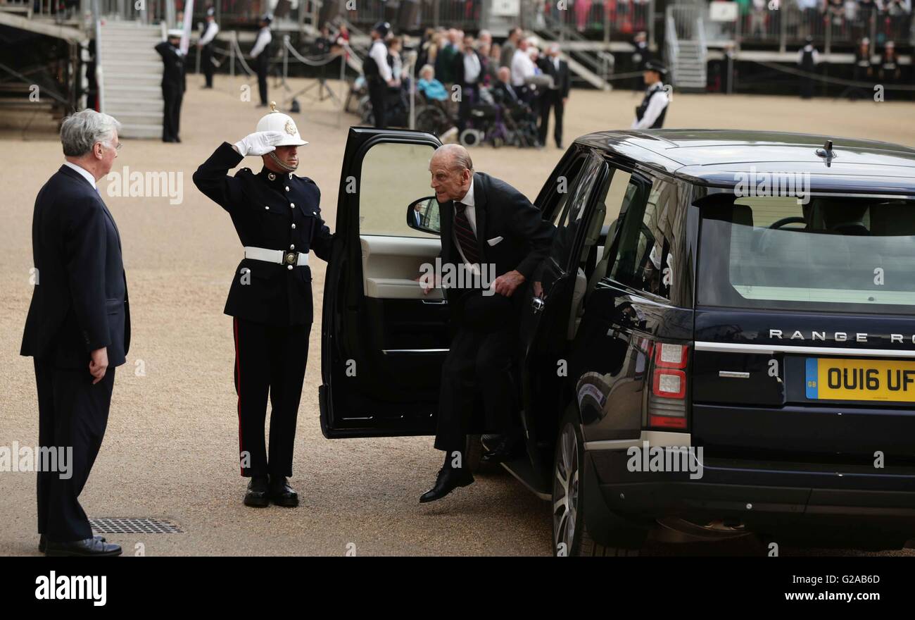 The Duke of Edinburgh is greeted by Defence Secretary Michael Fallon as ...