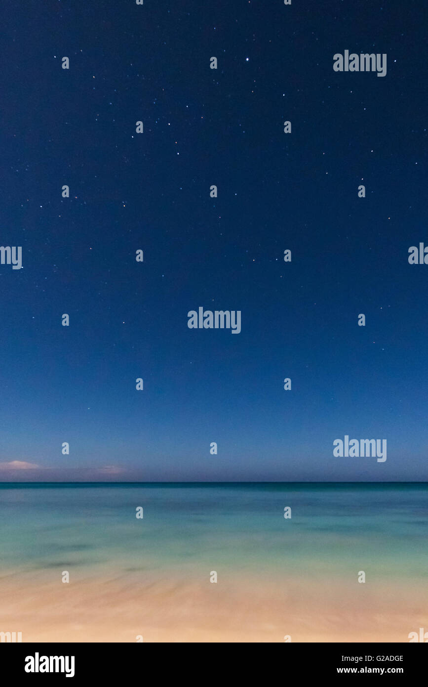 Stars on blue sky over sea Stock Photo - Alamy