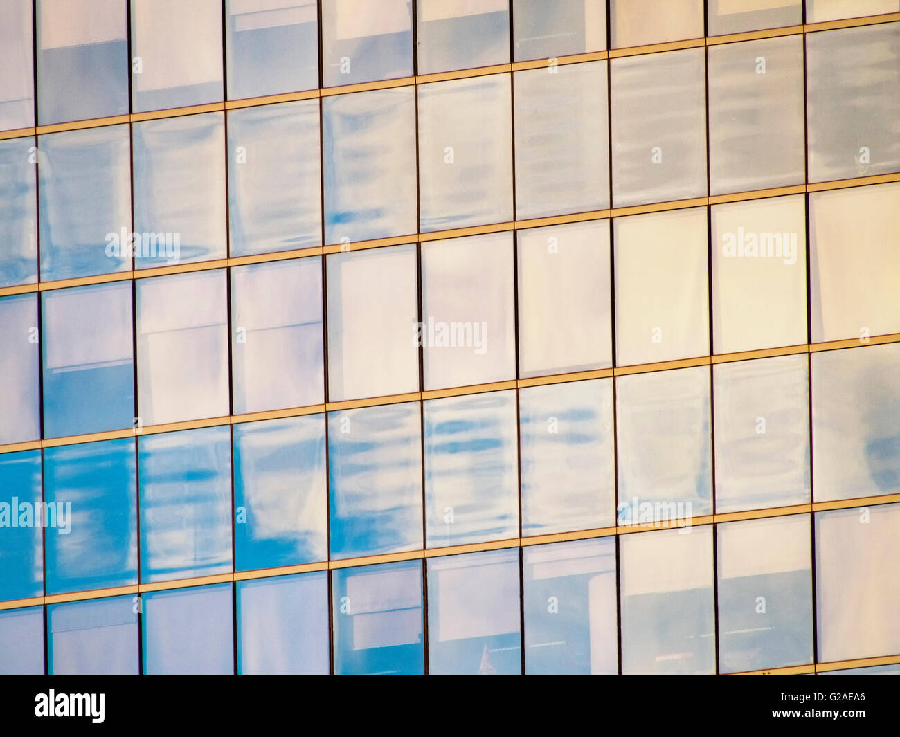 Sunlight reflecting in windows of office building Stock Photo - Alamy