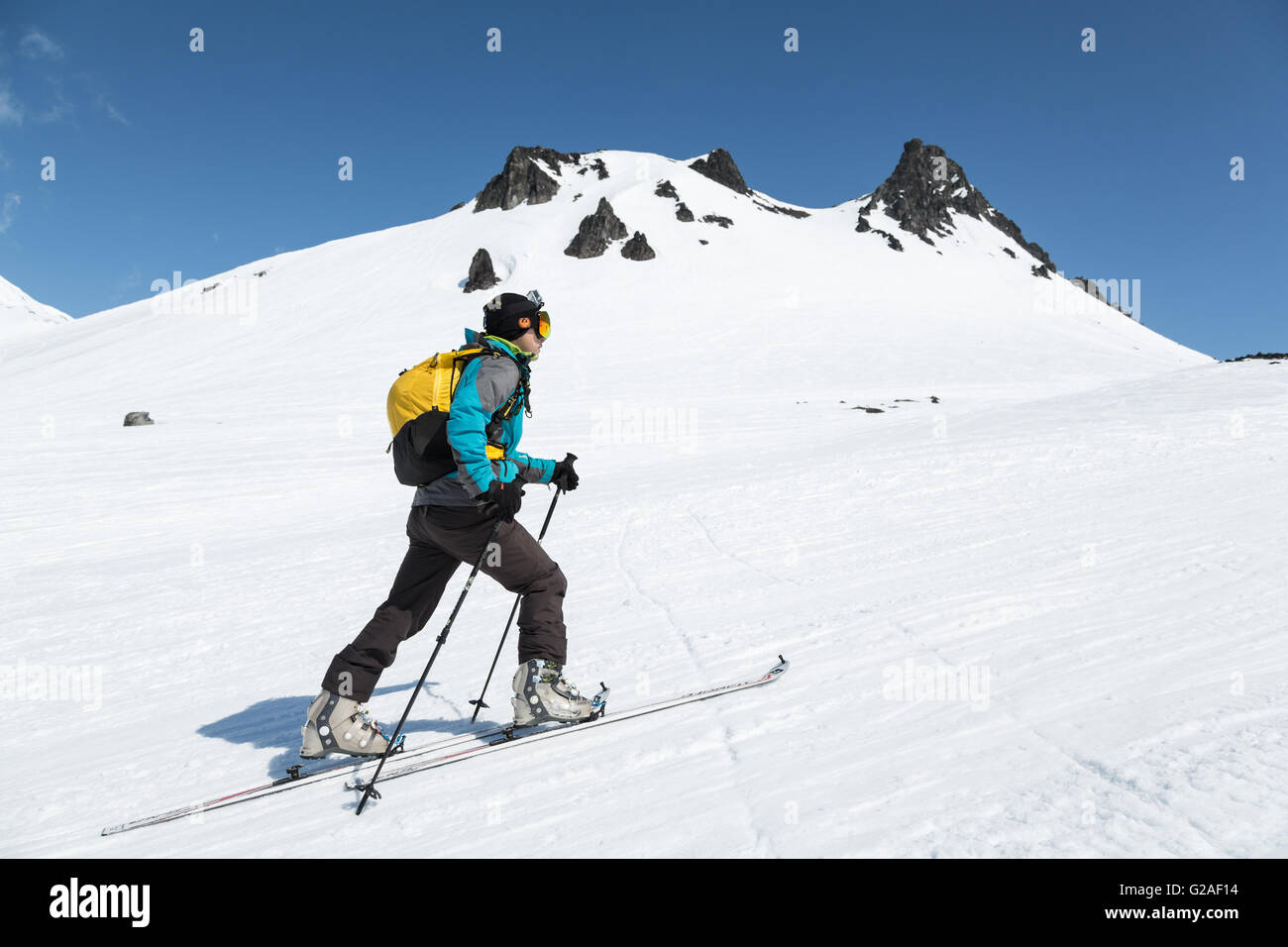 Skier climb mountain slope hi-res stock photography and images - Alamy