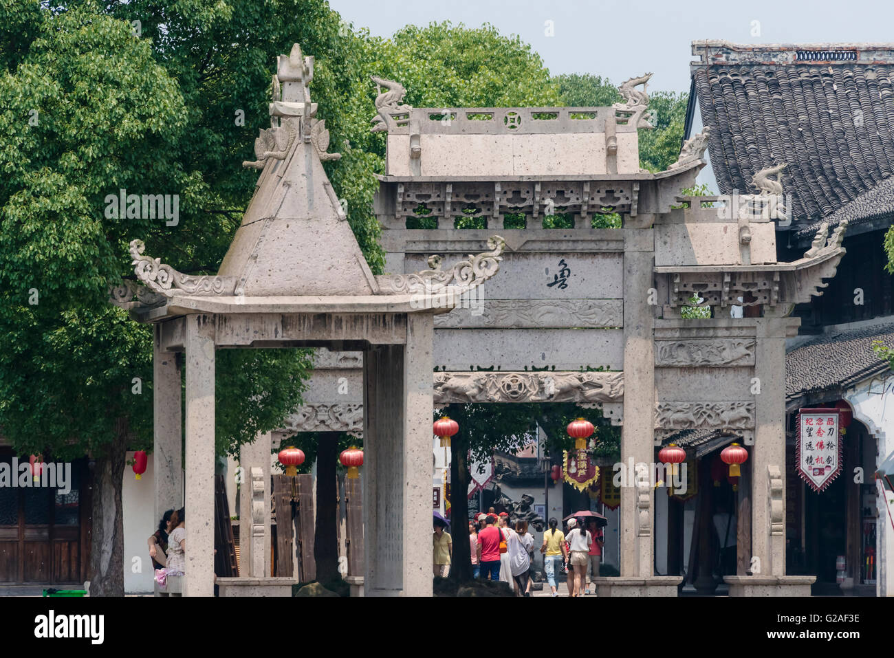 Traditional pavilion and memorial archway in the ancient town of Keyan ...