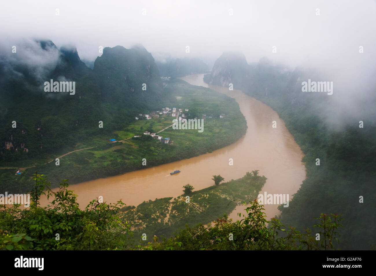 Karst hills with Li River in morning mist, Guilin, Guangxi Province ...