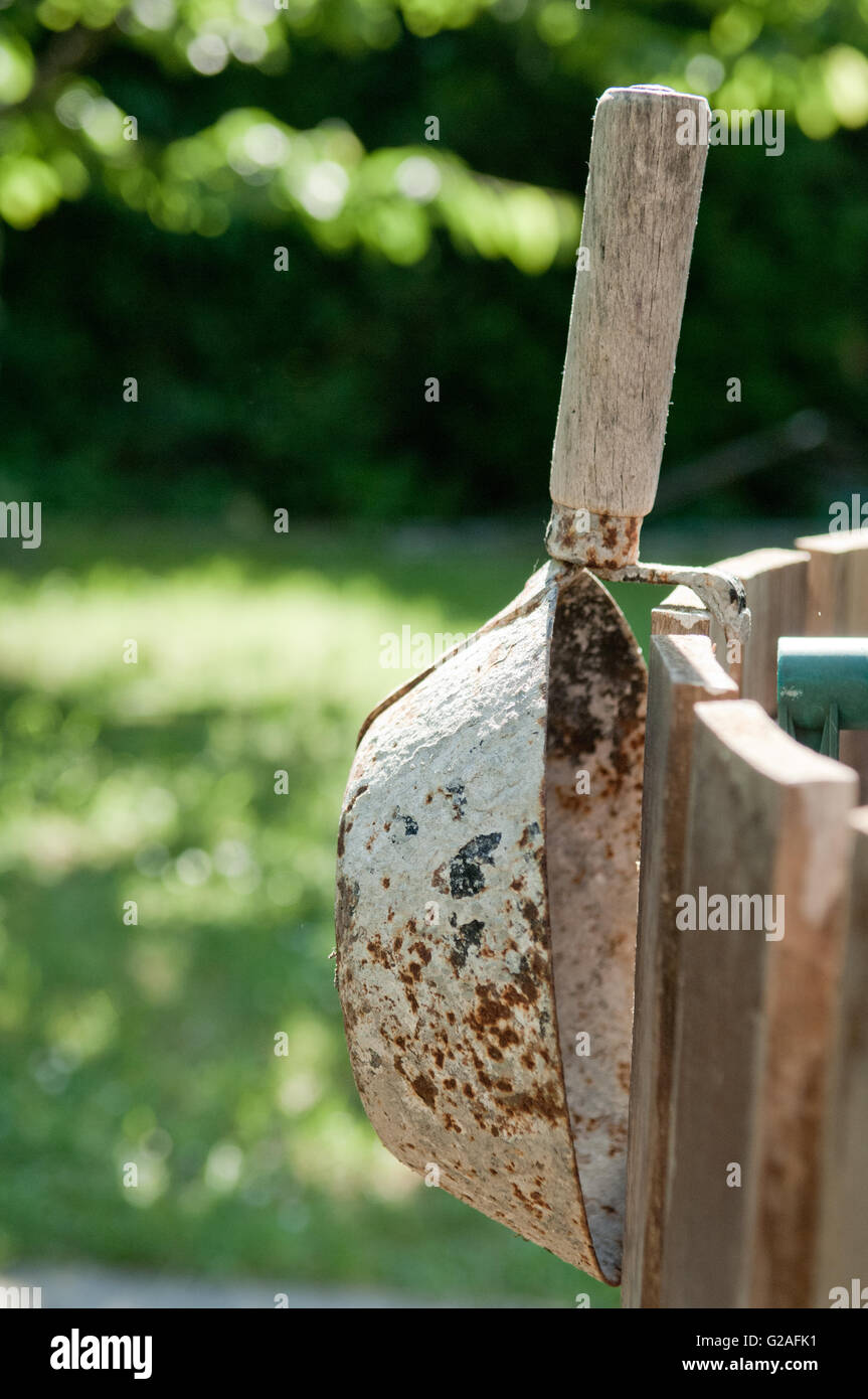 Dirty, rusty mortar hand tools trowel mason Stock Photo - Alamy