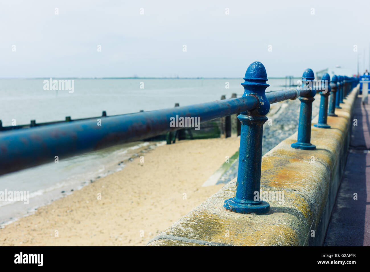 A rusty old railing by the seaside Stock Photo - Alamy