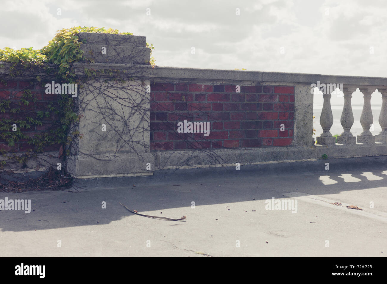 An old brick wall and balustrades by the seaside Stock Photo - Alamy
