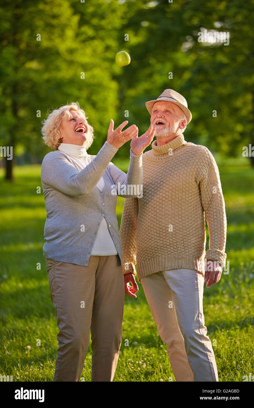 Throwing apple hi-res stock photography and images - Alamy