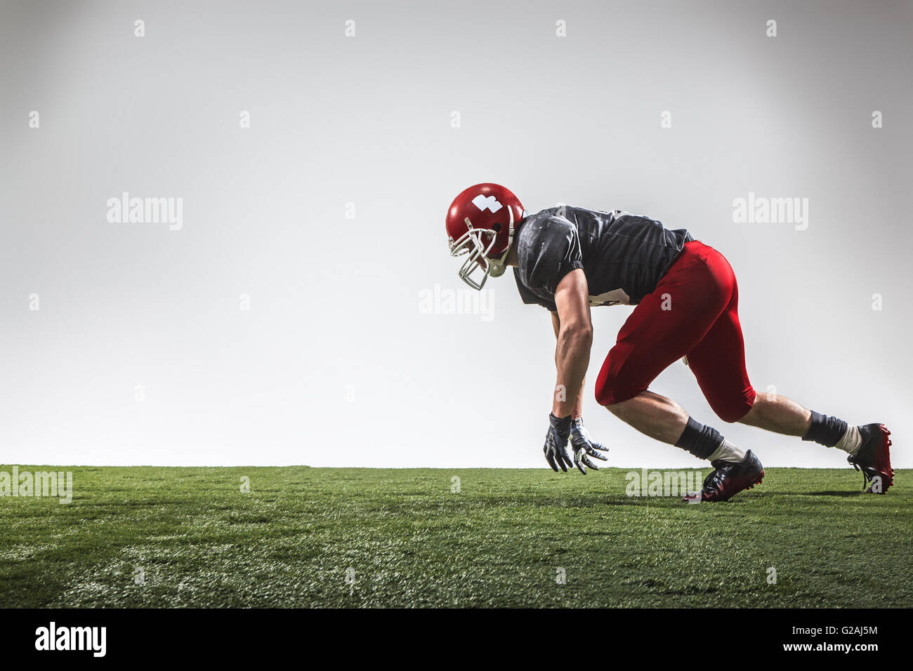 The american football player in action Stock Photo - Alamy