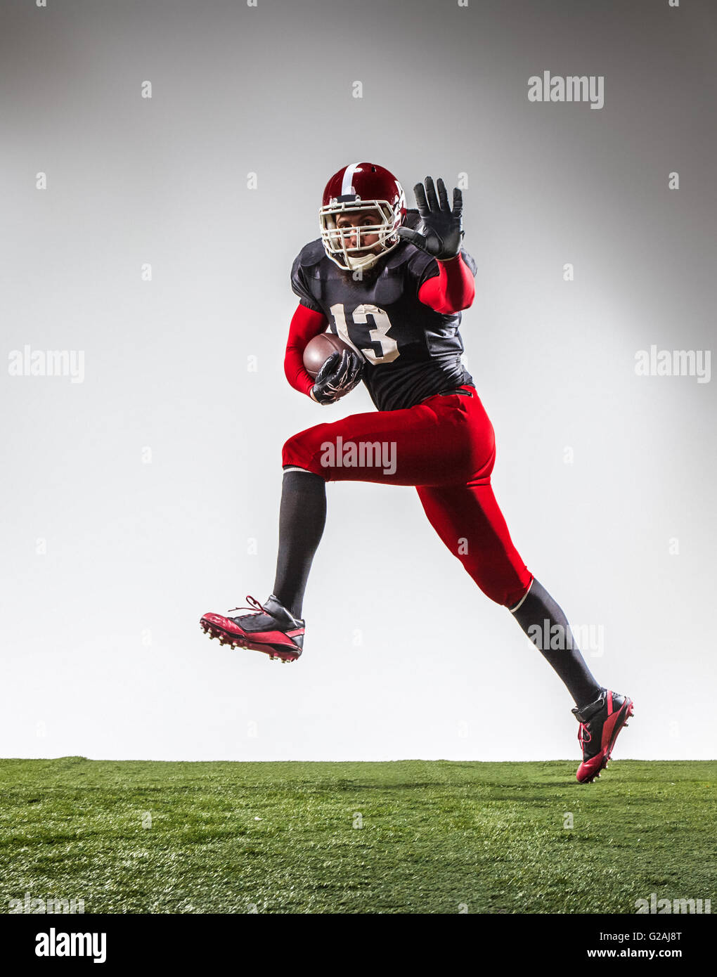 The american football player in action Stock Photo - Alamy