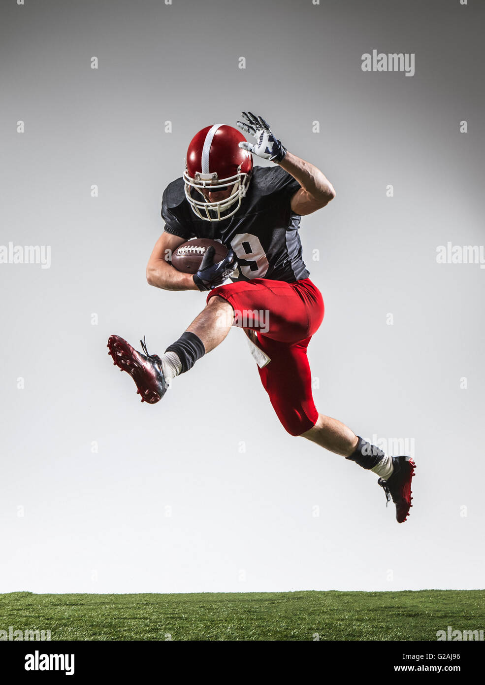 The american football player in action Stock Photo - Alamy