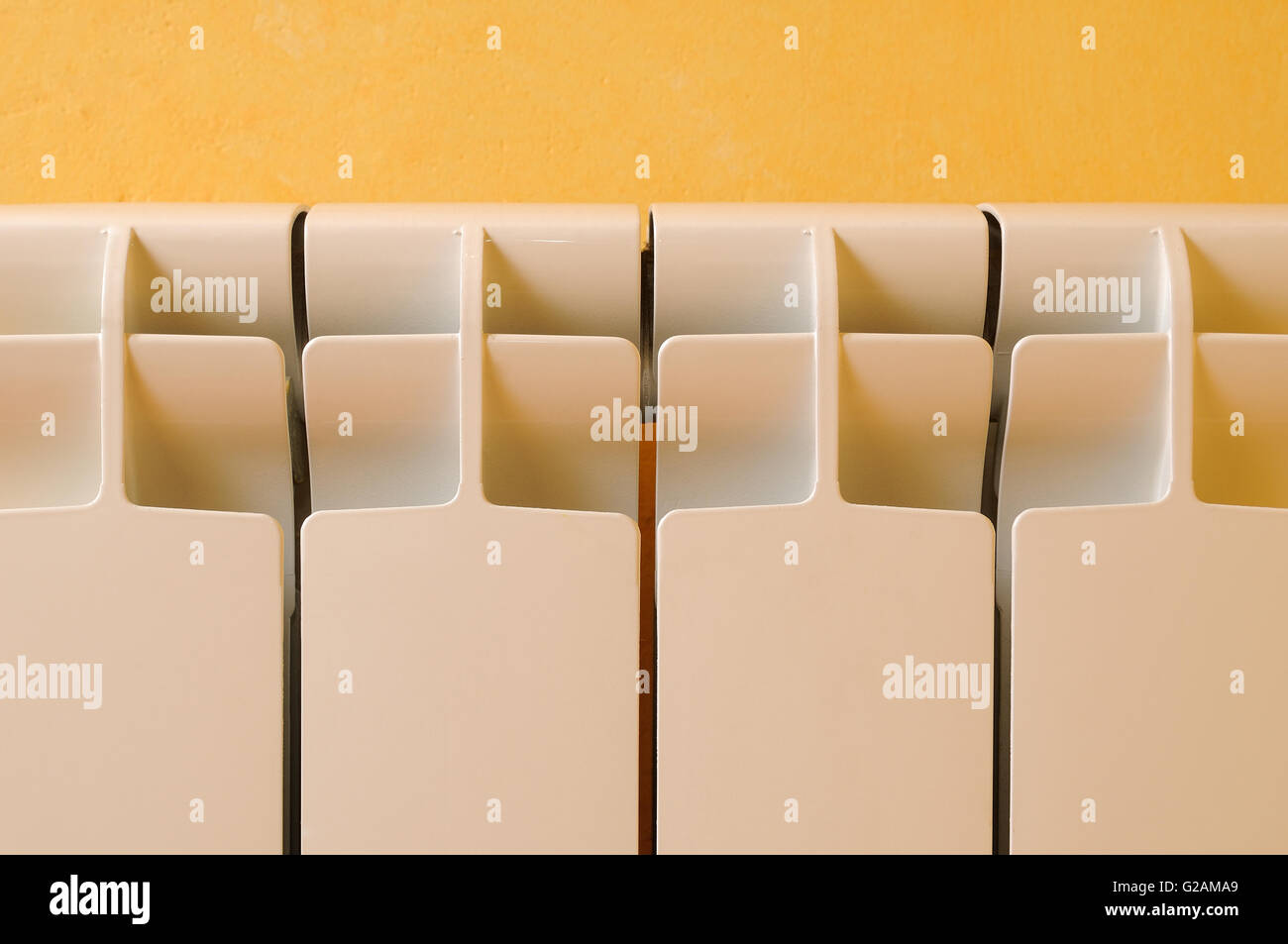 White aluminum heating radiator front view detail Stock Photo - Alamy