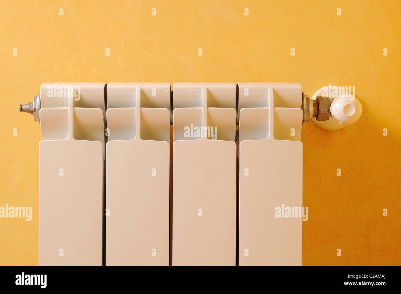 White aluminum heating radiator front view Stock Photo - Alamy