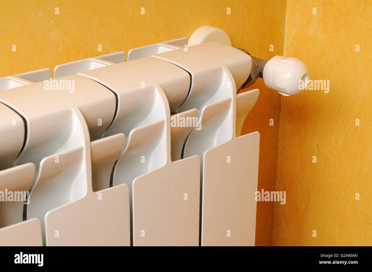 White aluminum heating radiator lateral view Stock Photo - Alamy