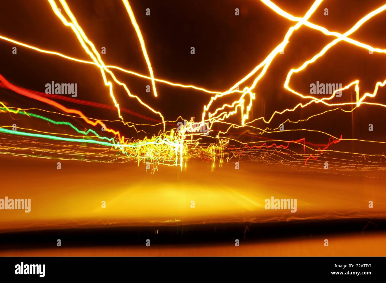 Streaks of light zig-zagging towards and away from the viewer Stock Photo - Alamy