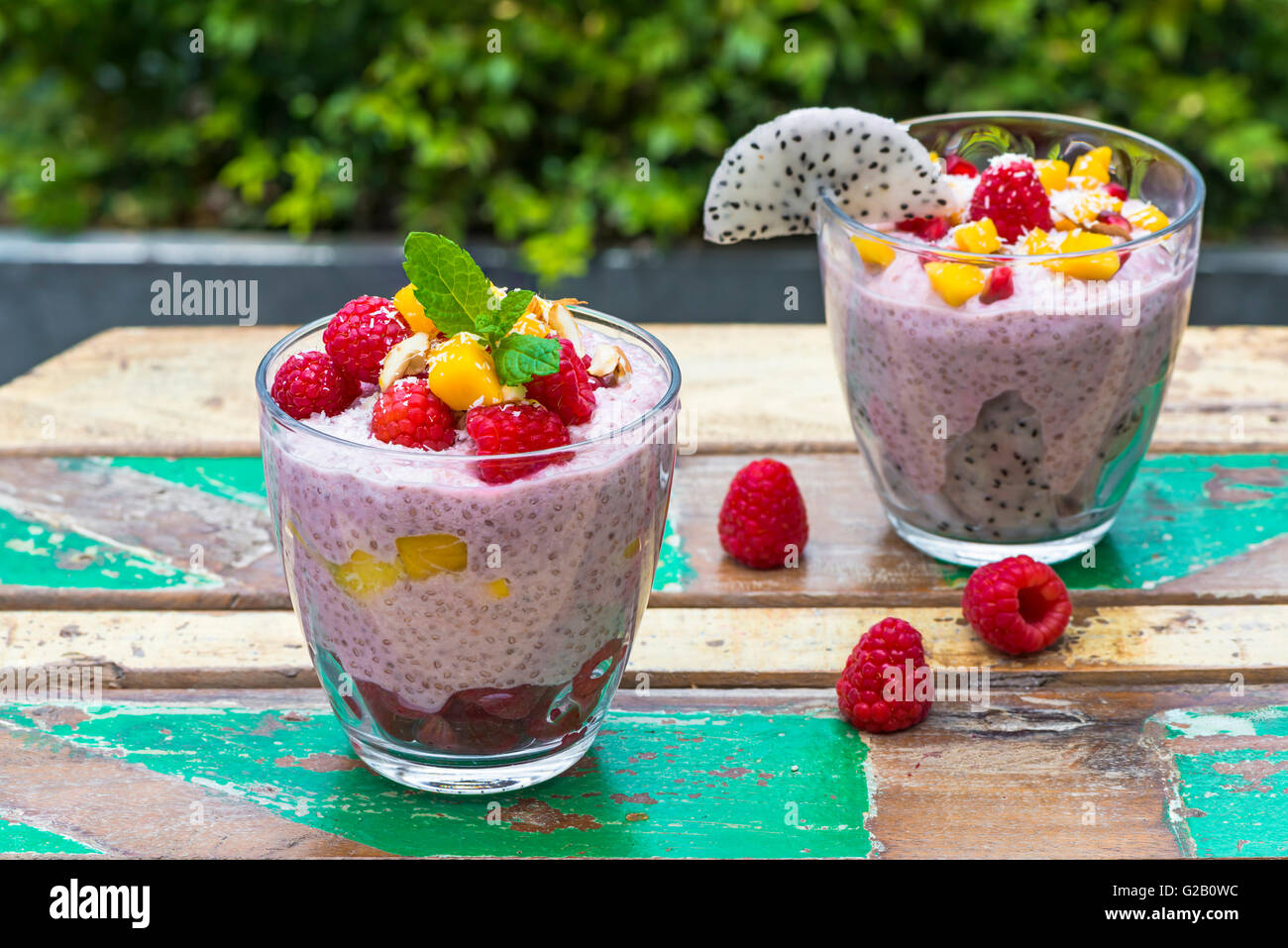 Raspberry Chia seed pudding layered and topped with fresh fruit Stock ...
