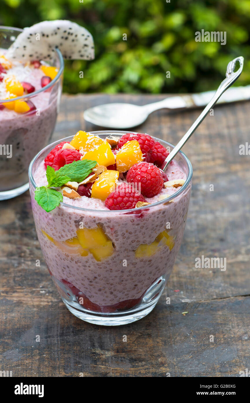 Raspberry Chia seed pudding layered and topped with fresh fruit Stock ...