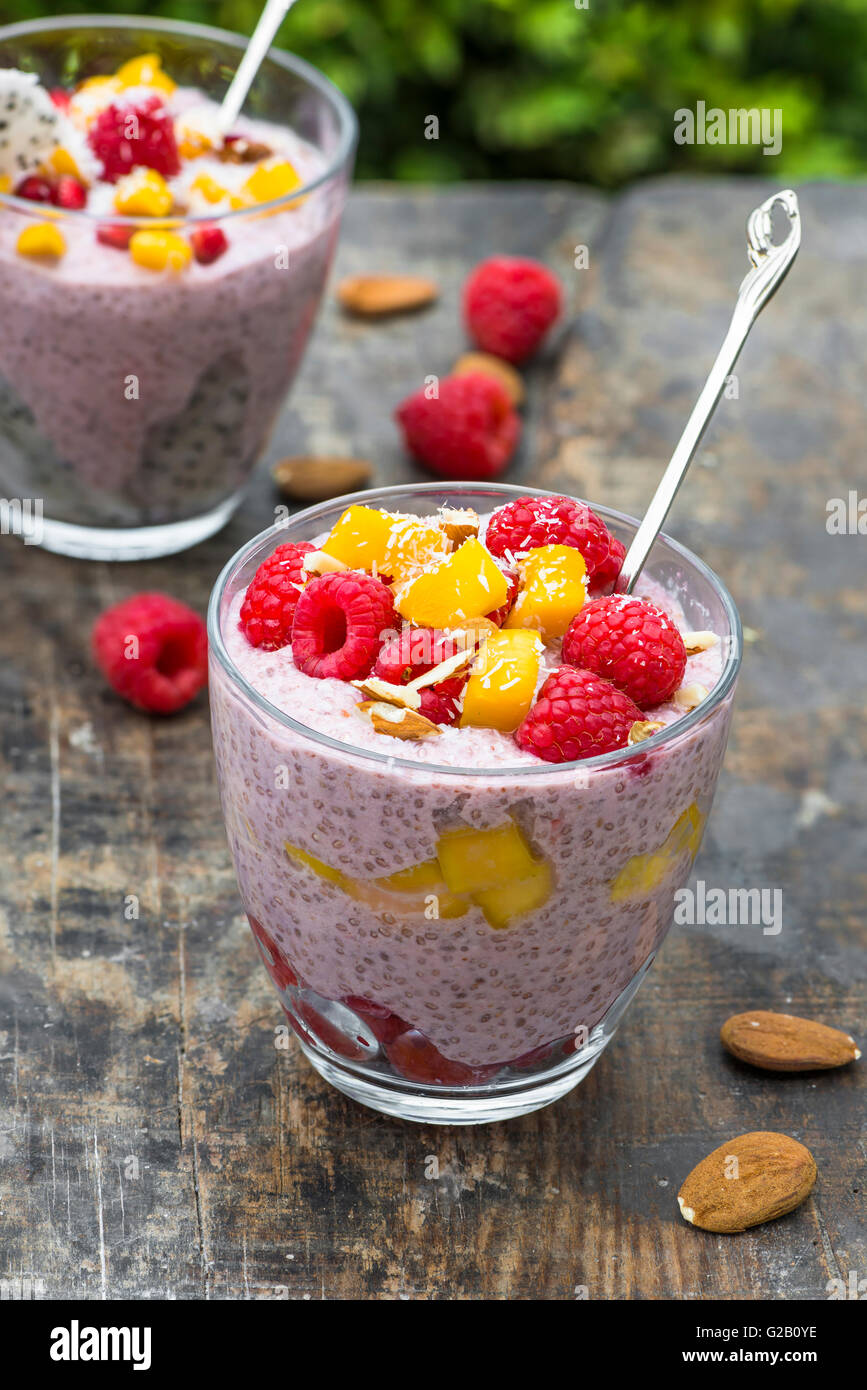 Raspberry Chia seed pudding layered and topped with fresh fruit Stock ...