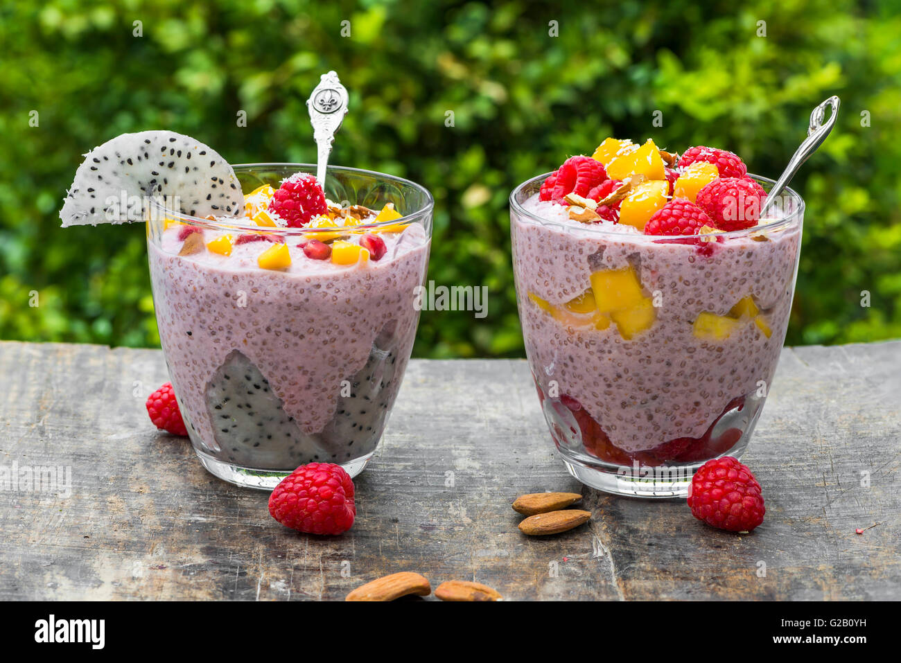 Raspberry Chia seed pudding layered and topped with fresh fruit Stock ...