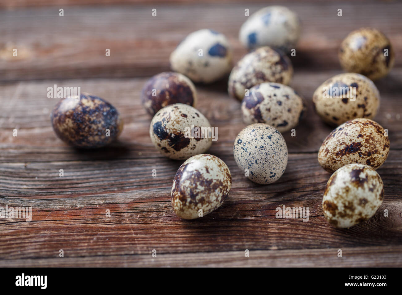 Group of quail eggs on thewooden background Stock Photo - Alamy