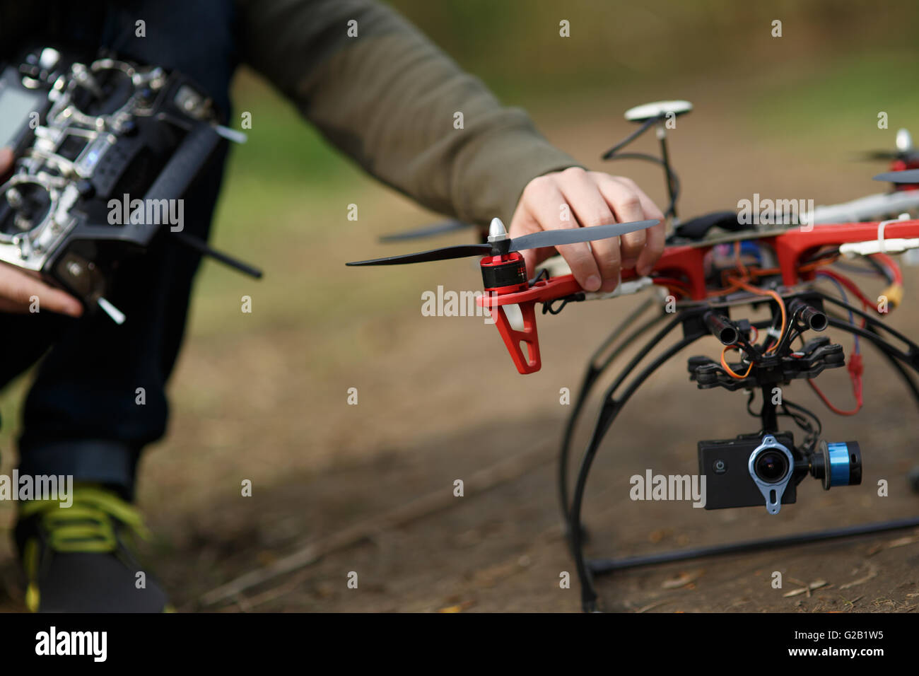 Closeup of man hand fixing propeller drone Stock Photo - Alamy
