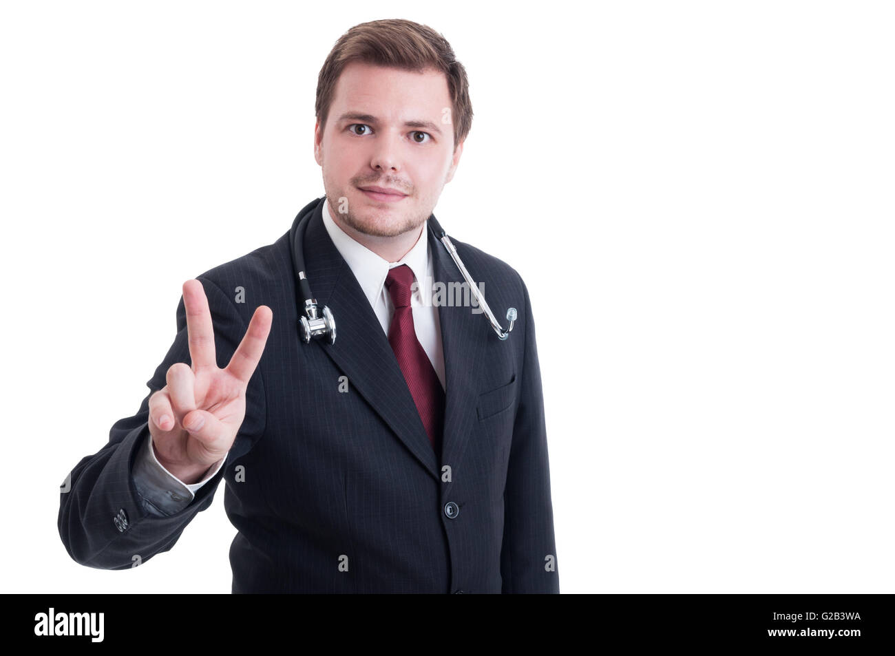 Medic or doctor making peace or victory gesture isolated on white ...