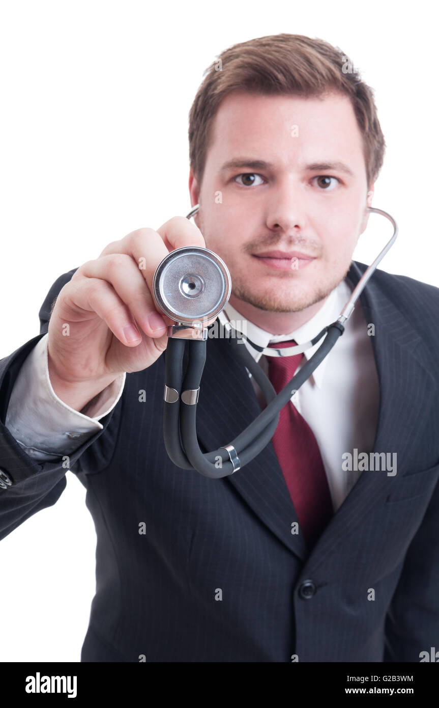 Suited doctor pointing stethoscope to the camera on white background ...