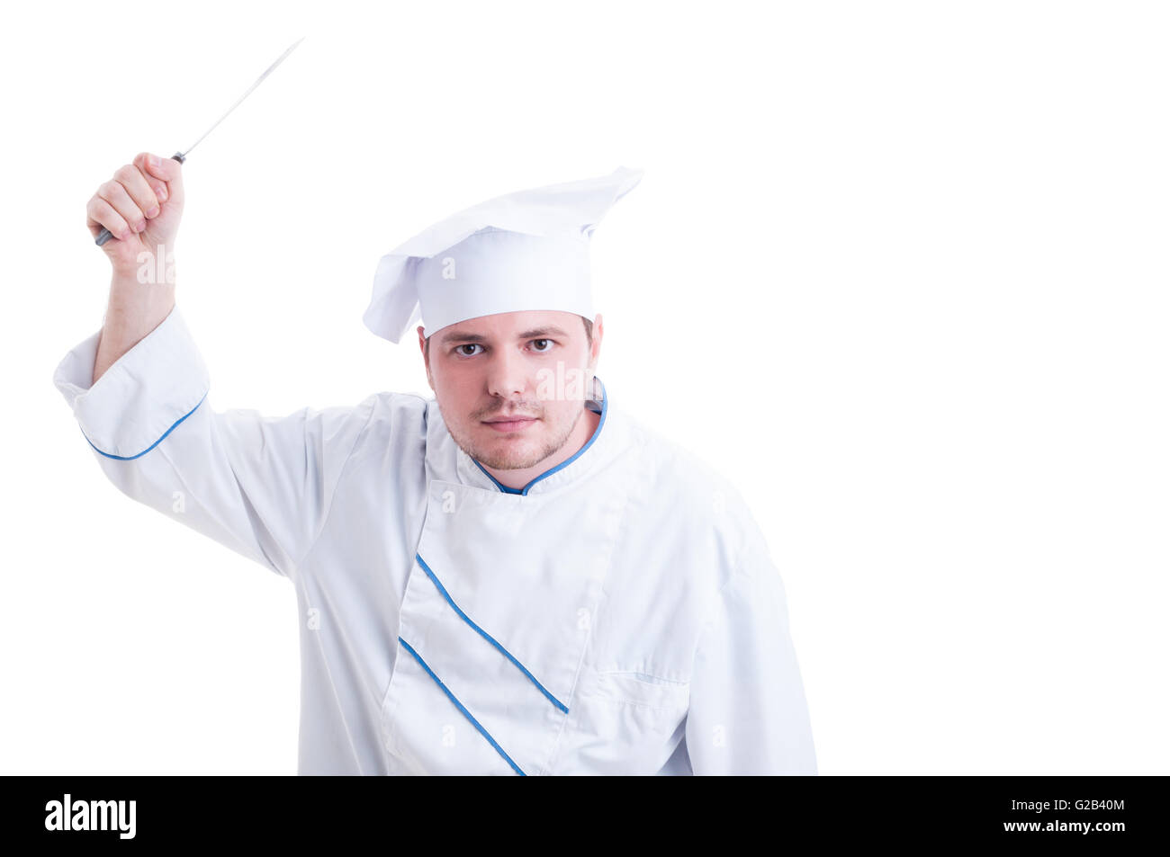 Aggressive chef or cook holding a big knife called cleaver isolated on ...