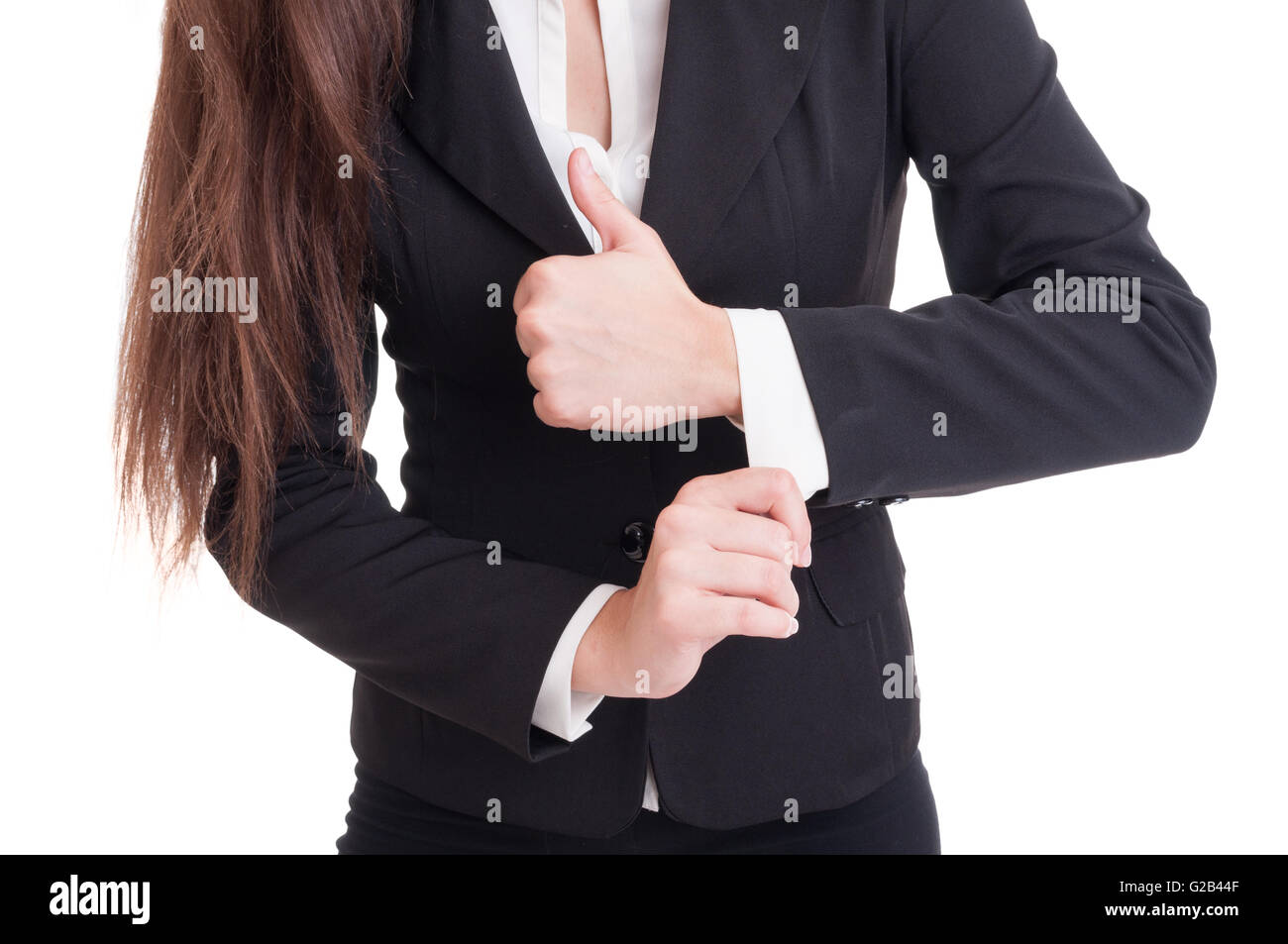 Closeup with business woman hands adjusting shirt and suit sleeve on ...