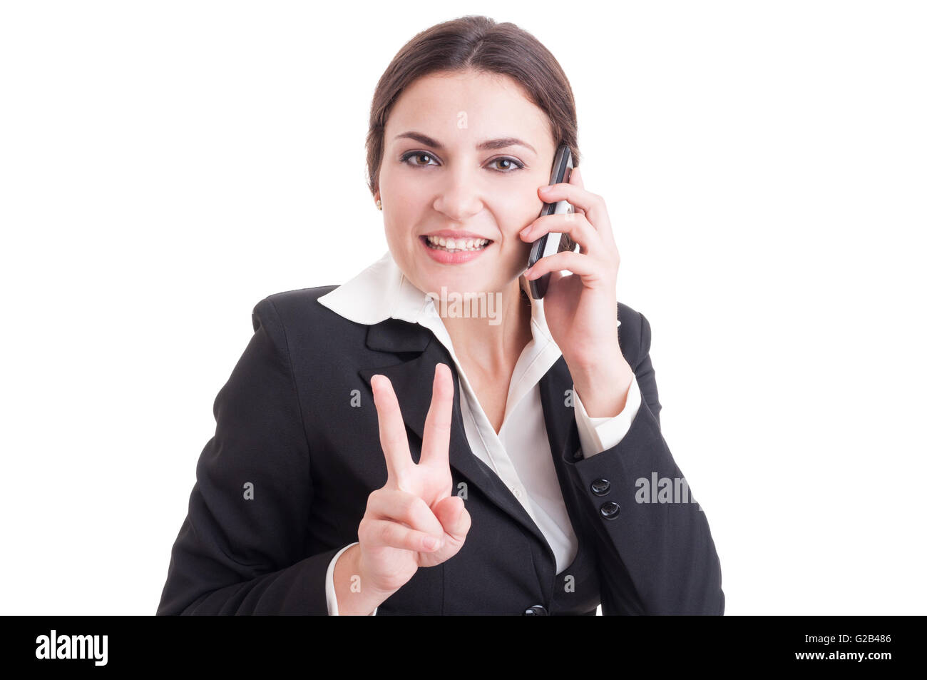 Smiling happy business woman showing victory or peace gesture while ...
