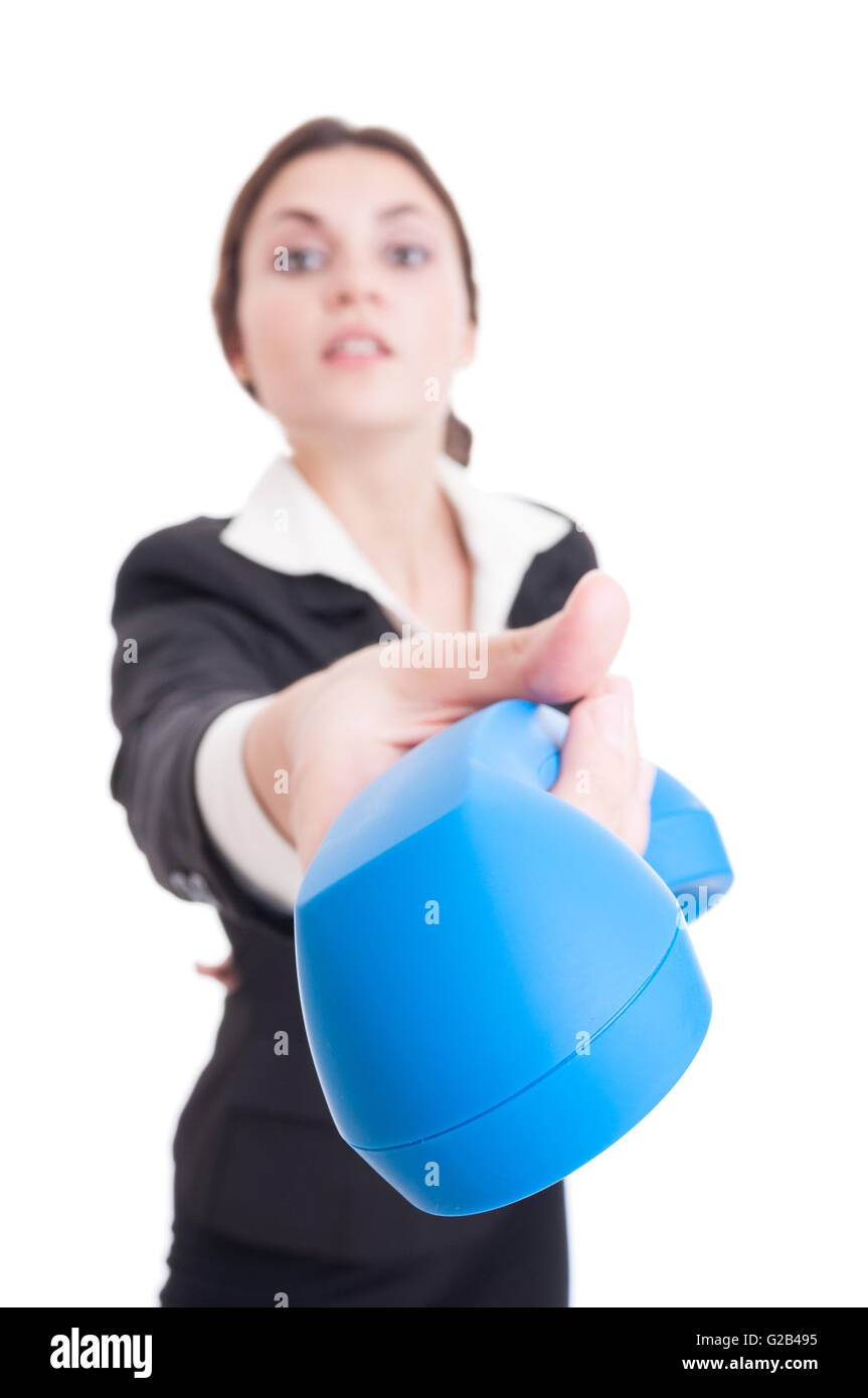 Female contact person showing and offering classic telephone as ...
