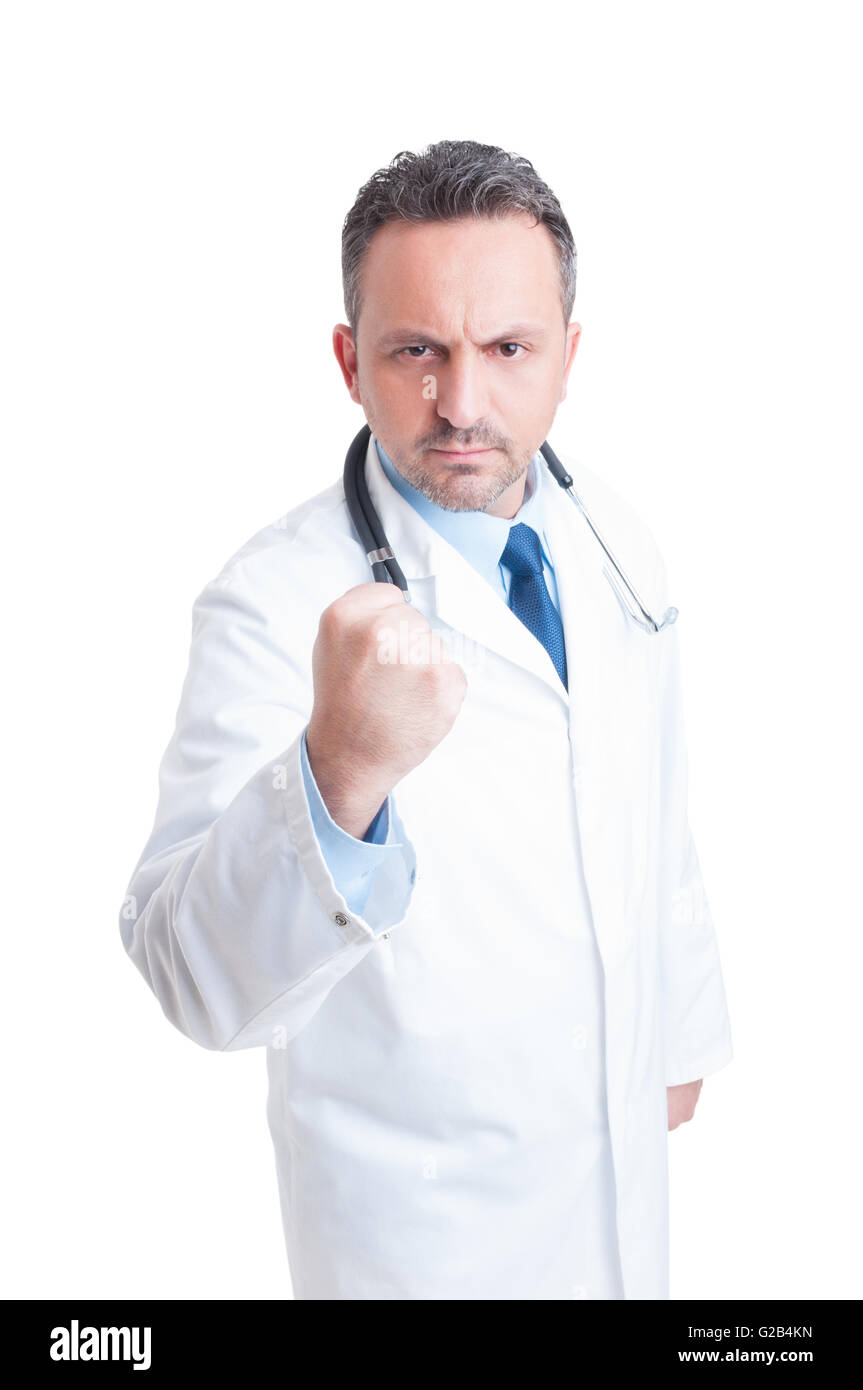 Young medic or doctor showing fist and threatening isolated on white ...