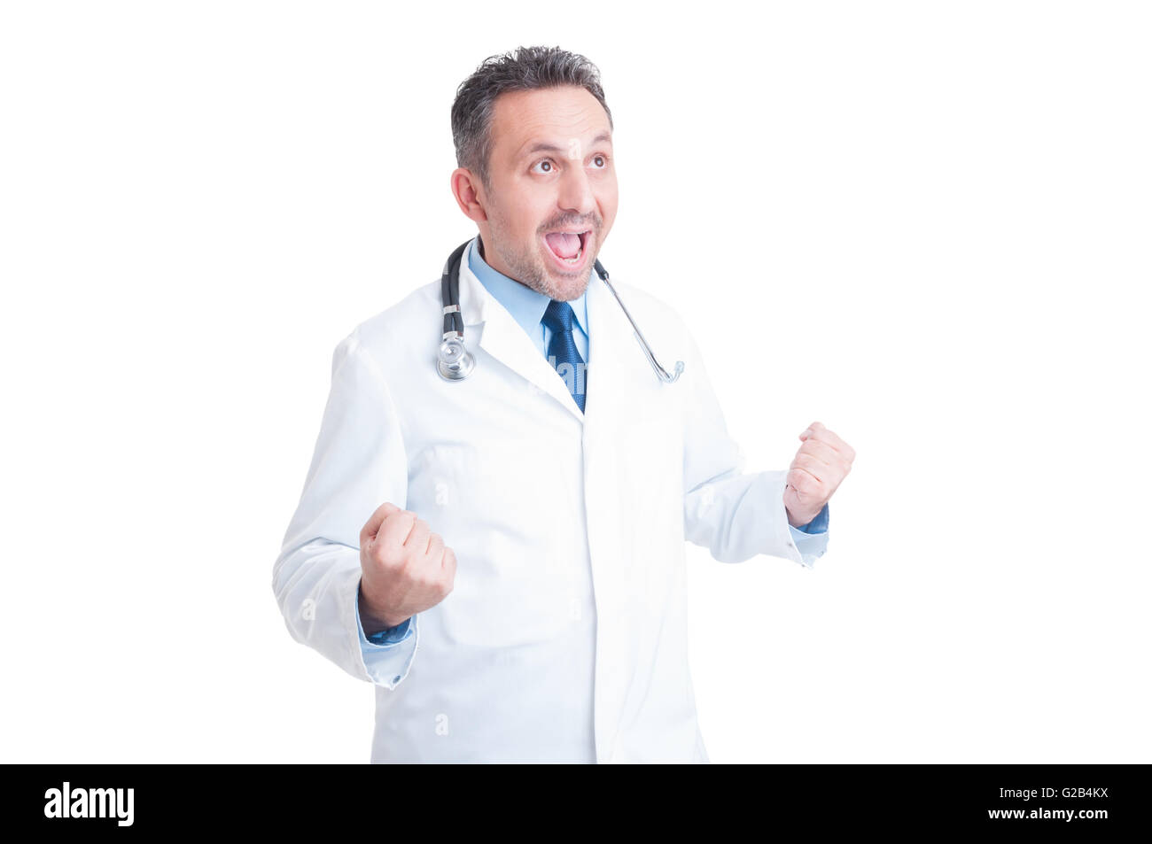 Excited medic or doctor acting cheerful as a winner isolated on white ...