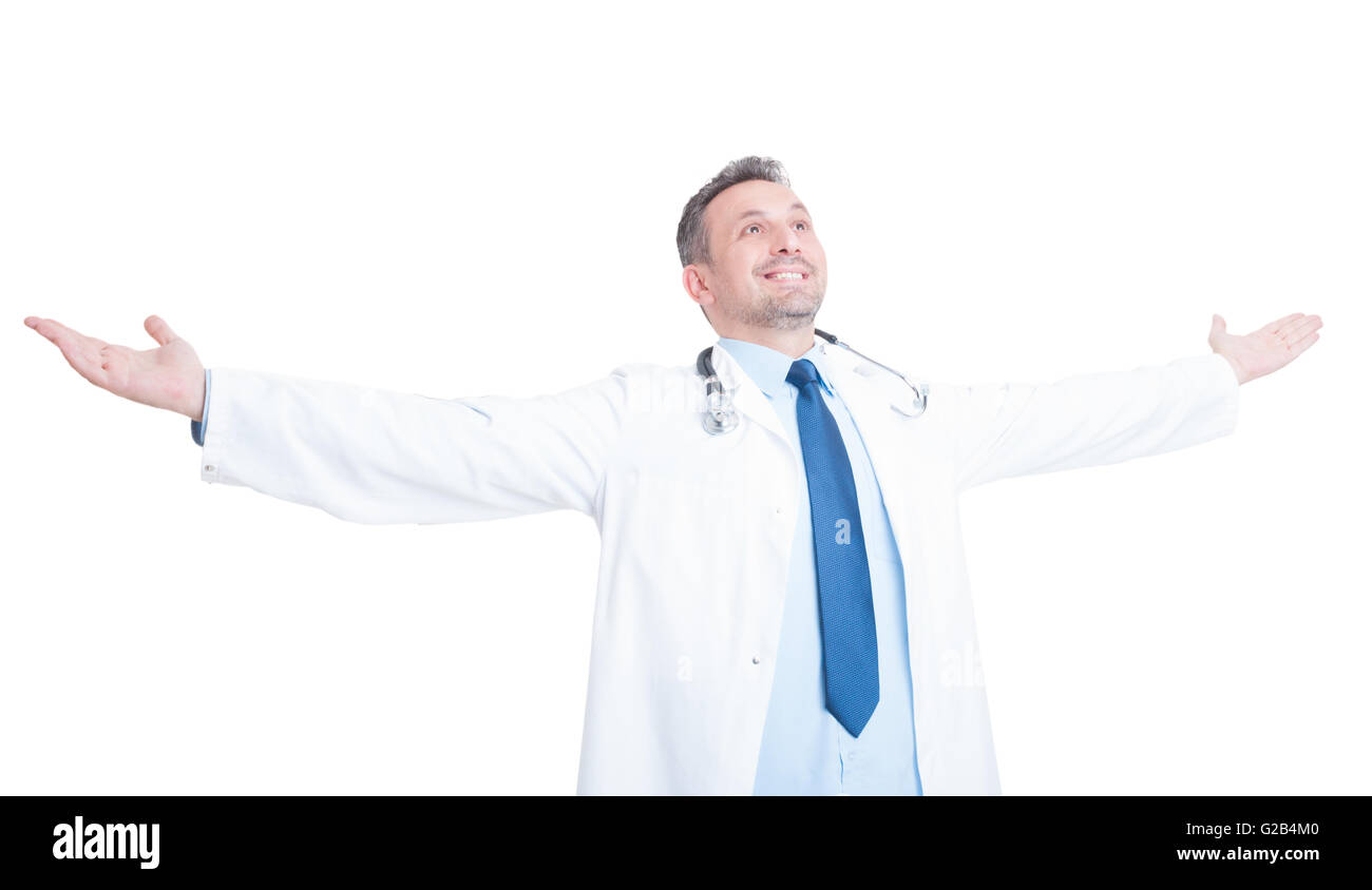 Happy doctor or medic raising hands outspread and outstretched isolated ...