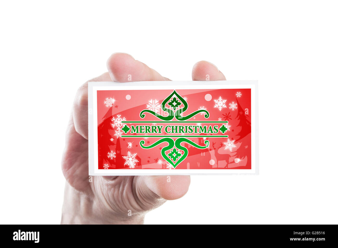Hand holding merry Christmas card isolated on white background Stock ...