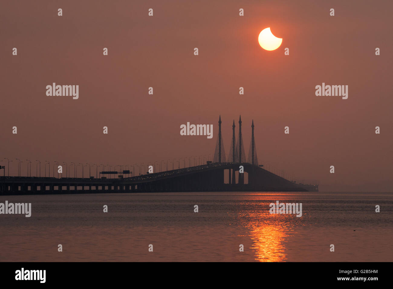 Solar Eclipse in Penang Bridge, Malaysia Stock Photo - Alamy