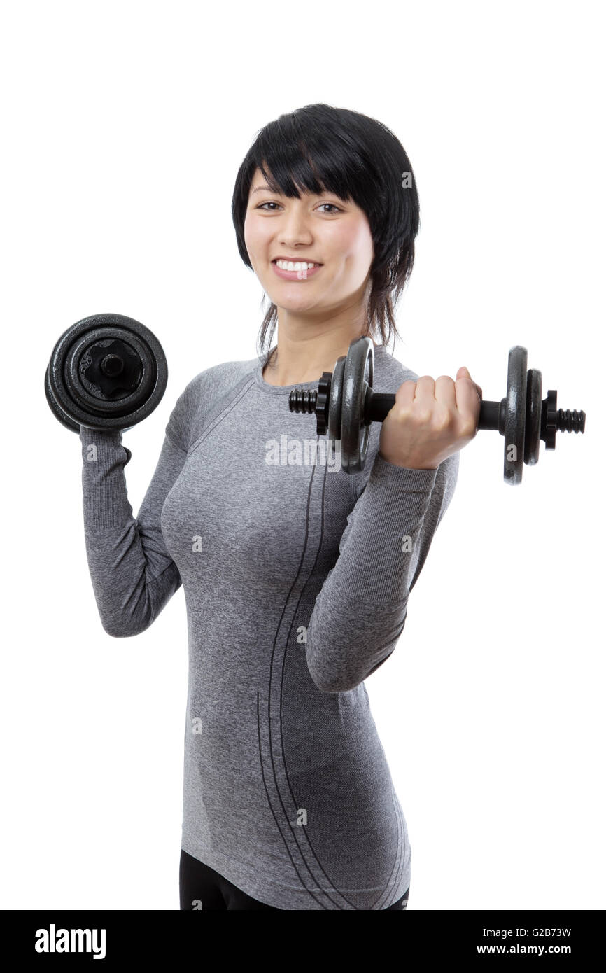 Upper body shot of a slim young female fitness model, wearing a long ...