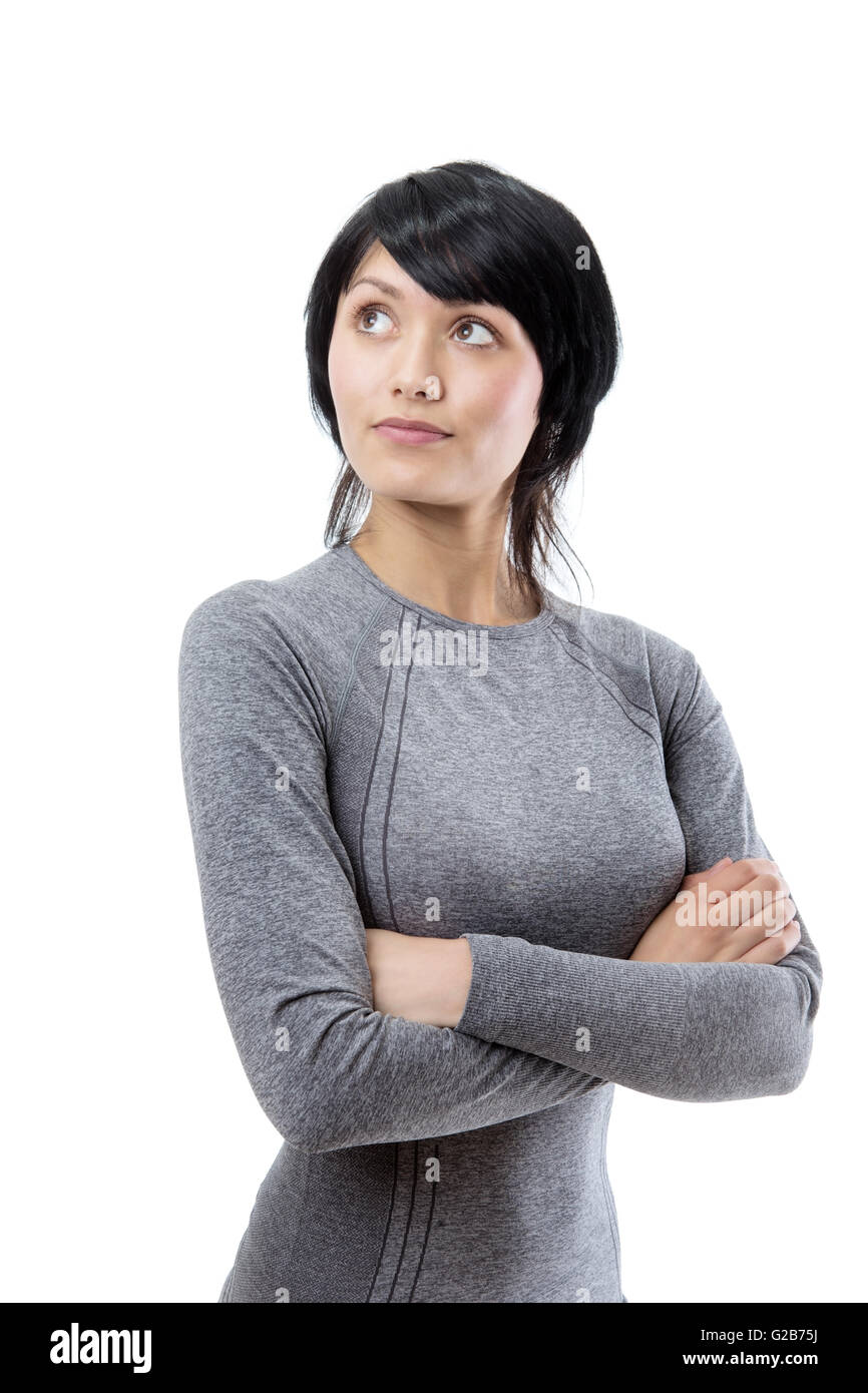 Upper body shot of a slim young female fitness model, wearing a long ...