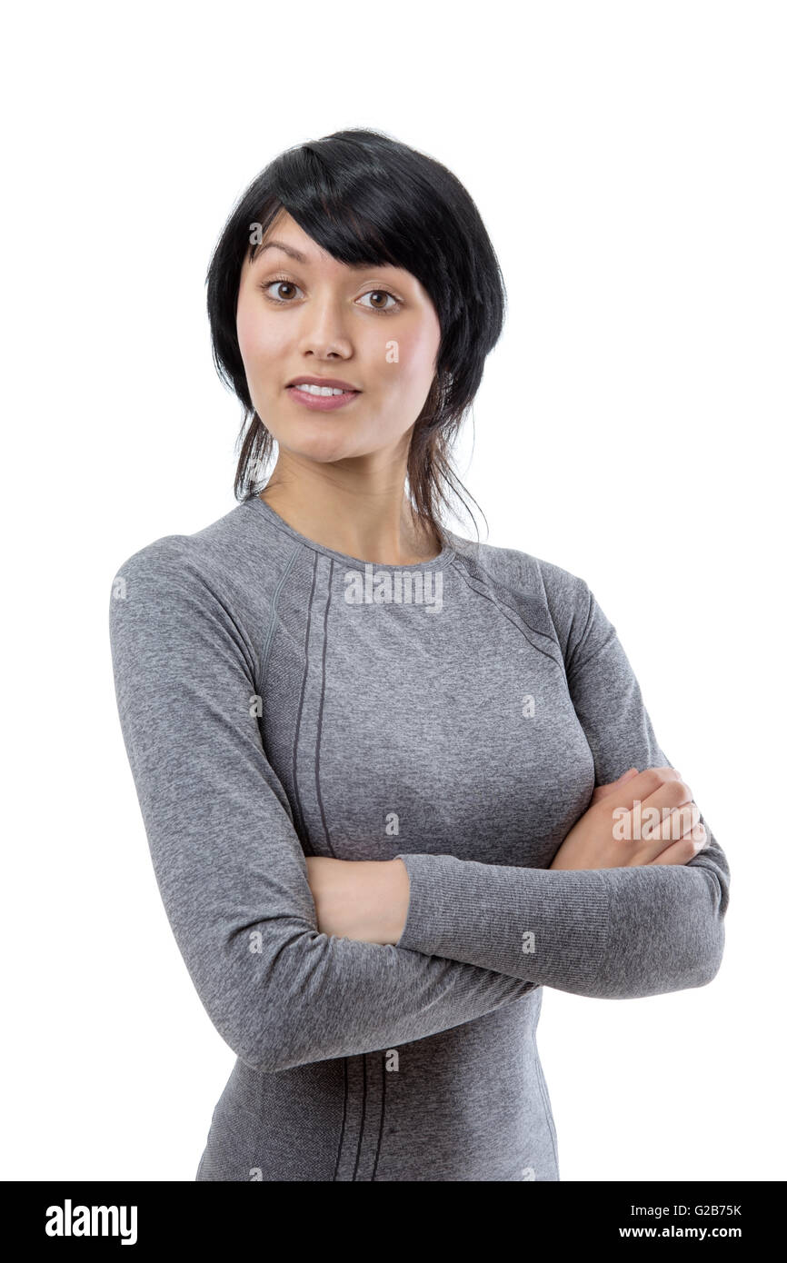 Upper body shot of a slim young female fitness model, wearing a long ...