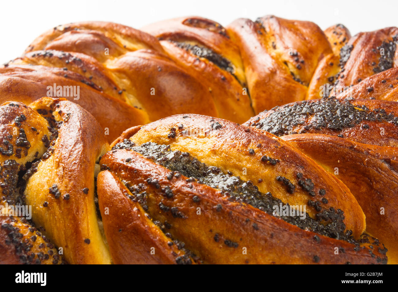 braided poppy seed round loaf on white background Stock Photo - Alamy