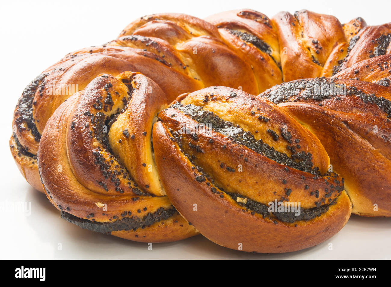 braided poppy seed round loaf on white background Stock Photo - Alamy