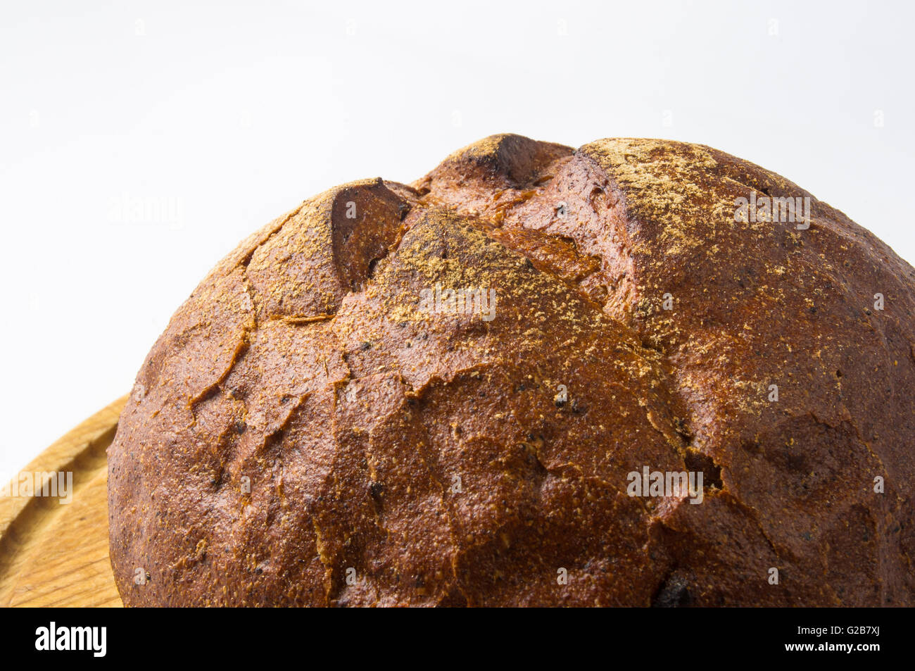 dark bread with crumbs on wood board Stock Photo - Alamy