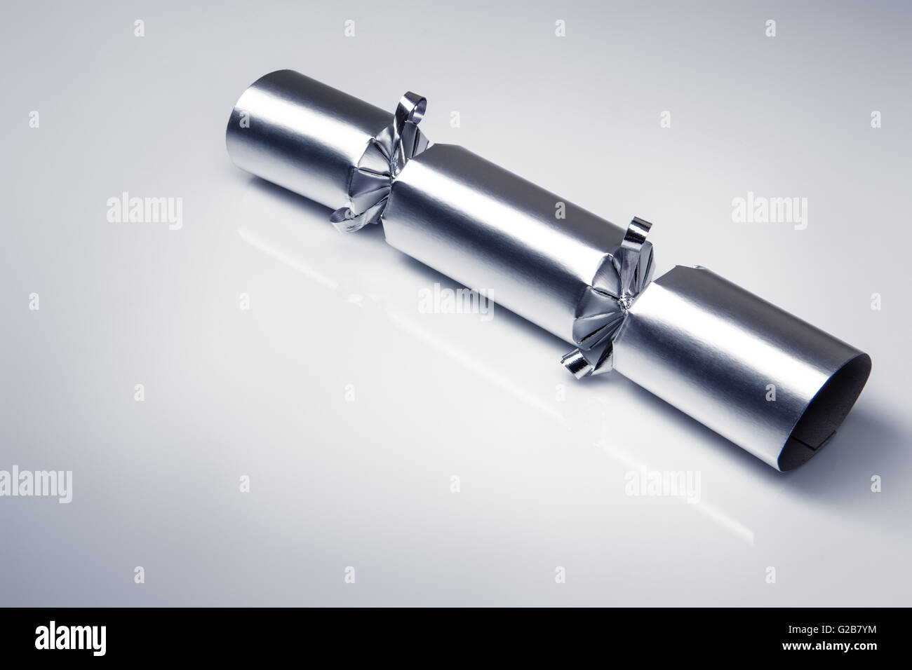 still life image of single single christmas cracker on plain background ...