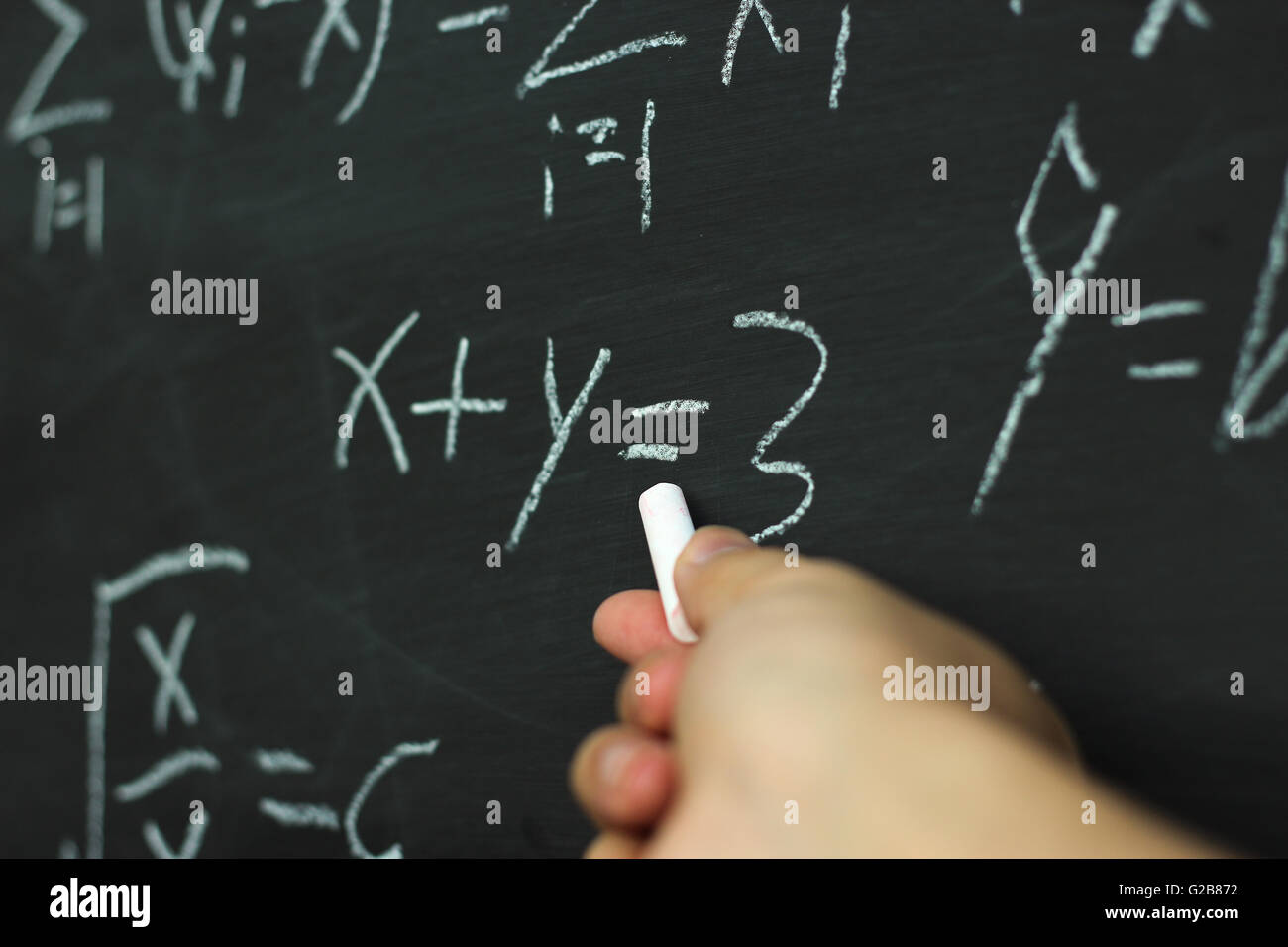Hand writing trigonometry formula on hi-res stock photography and ...