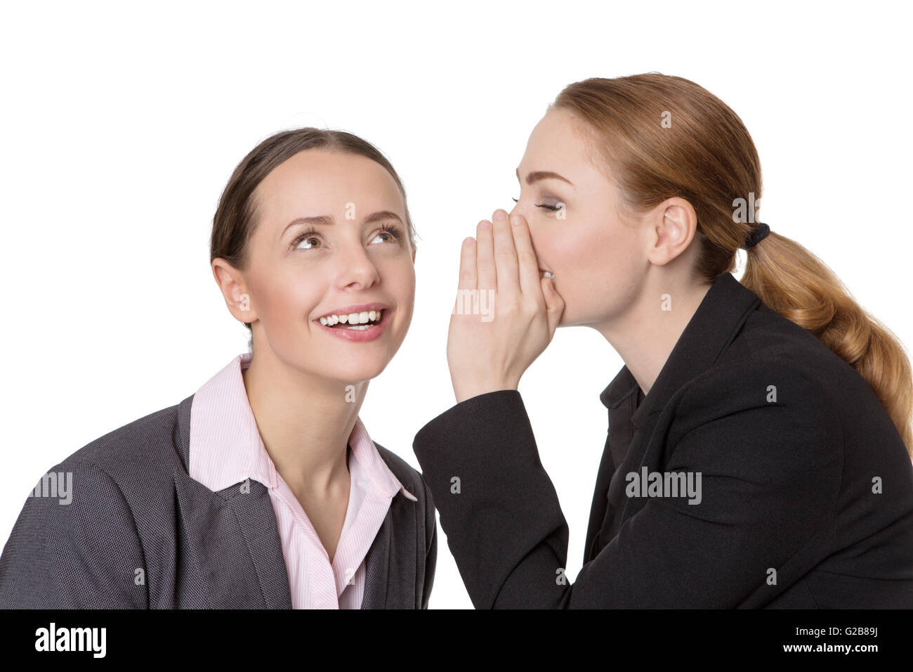 Whisper ear suit hi-res stock photography and images - Alamy