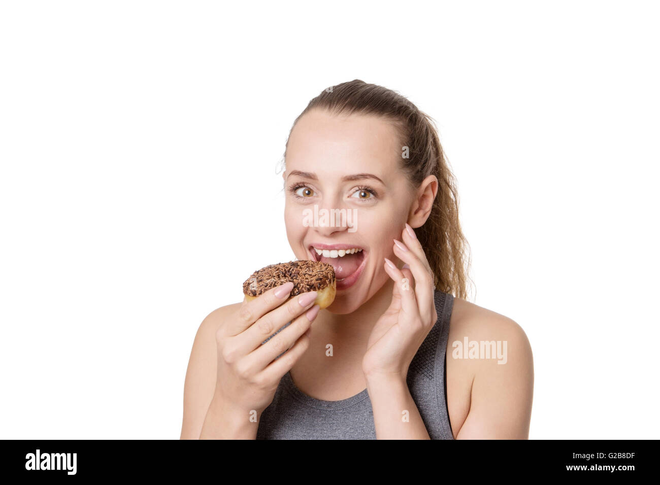 Woman eating sweet donuts hi-res stock photography and images - Alamy