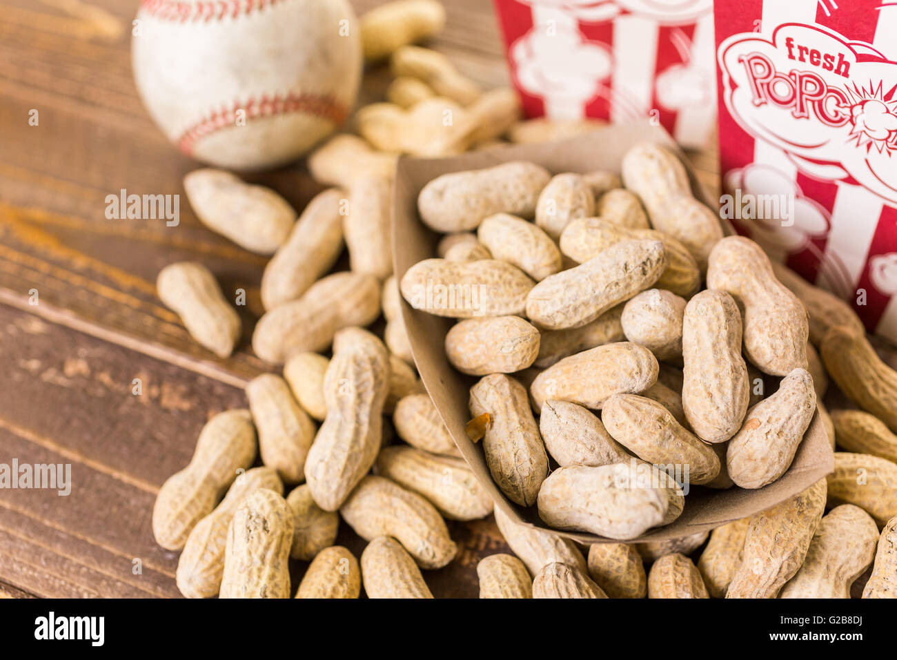 Game day traditional snacks included corndogs and salted peanuts on a ...