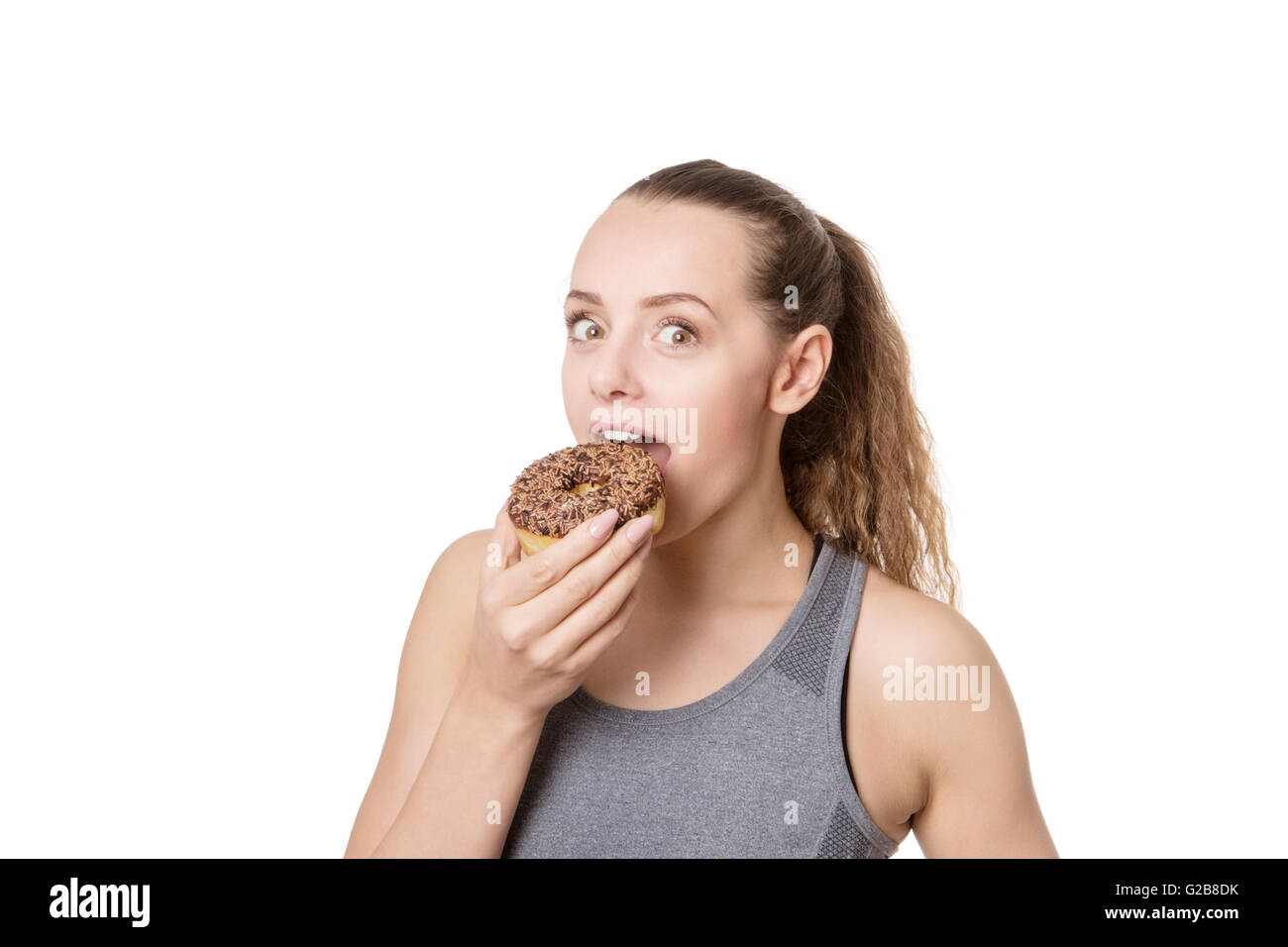 Woman eating sweet donuts hi-res stock photography and images - Alamy
