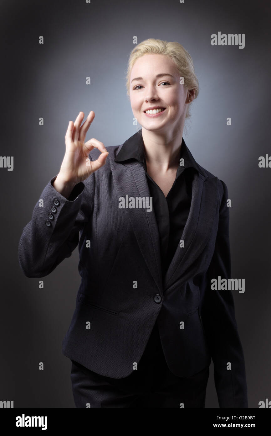 Business lady gesturing studio hi-res stock photography and images - Alamy