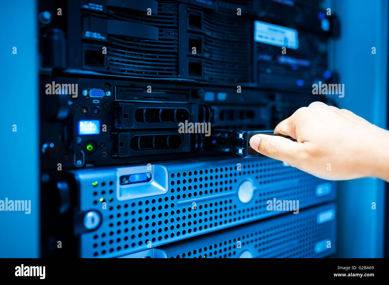 People fix server network in data room Stock Photo - Alamy